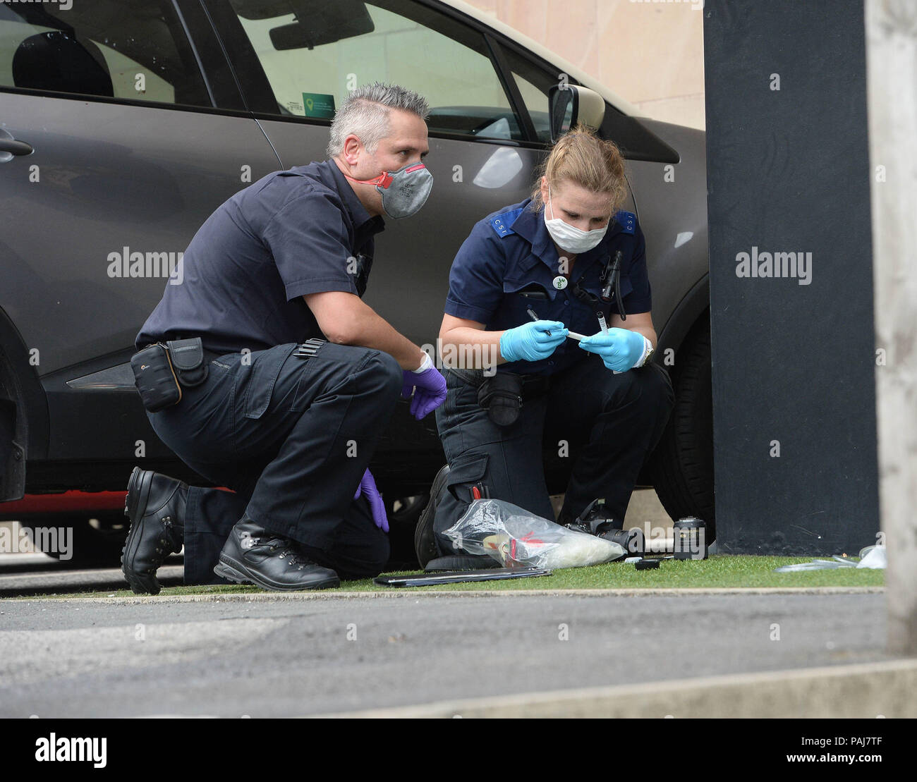 Crime scene investigators at the scene near the hilton hotel hi-res ...