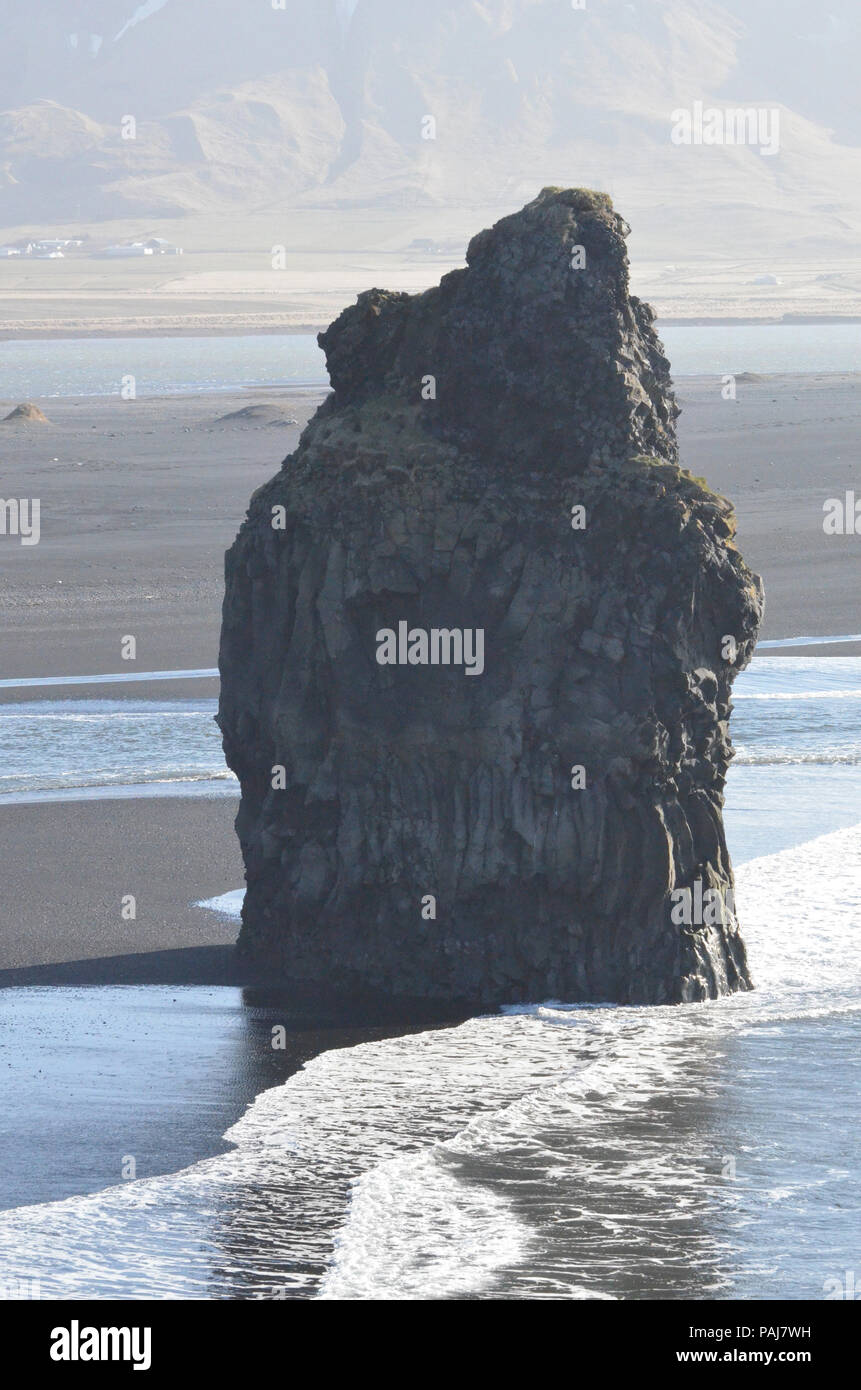 Beautiful rock formation during low tide in Vik Iceland Stock Photo - Alamy