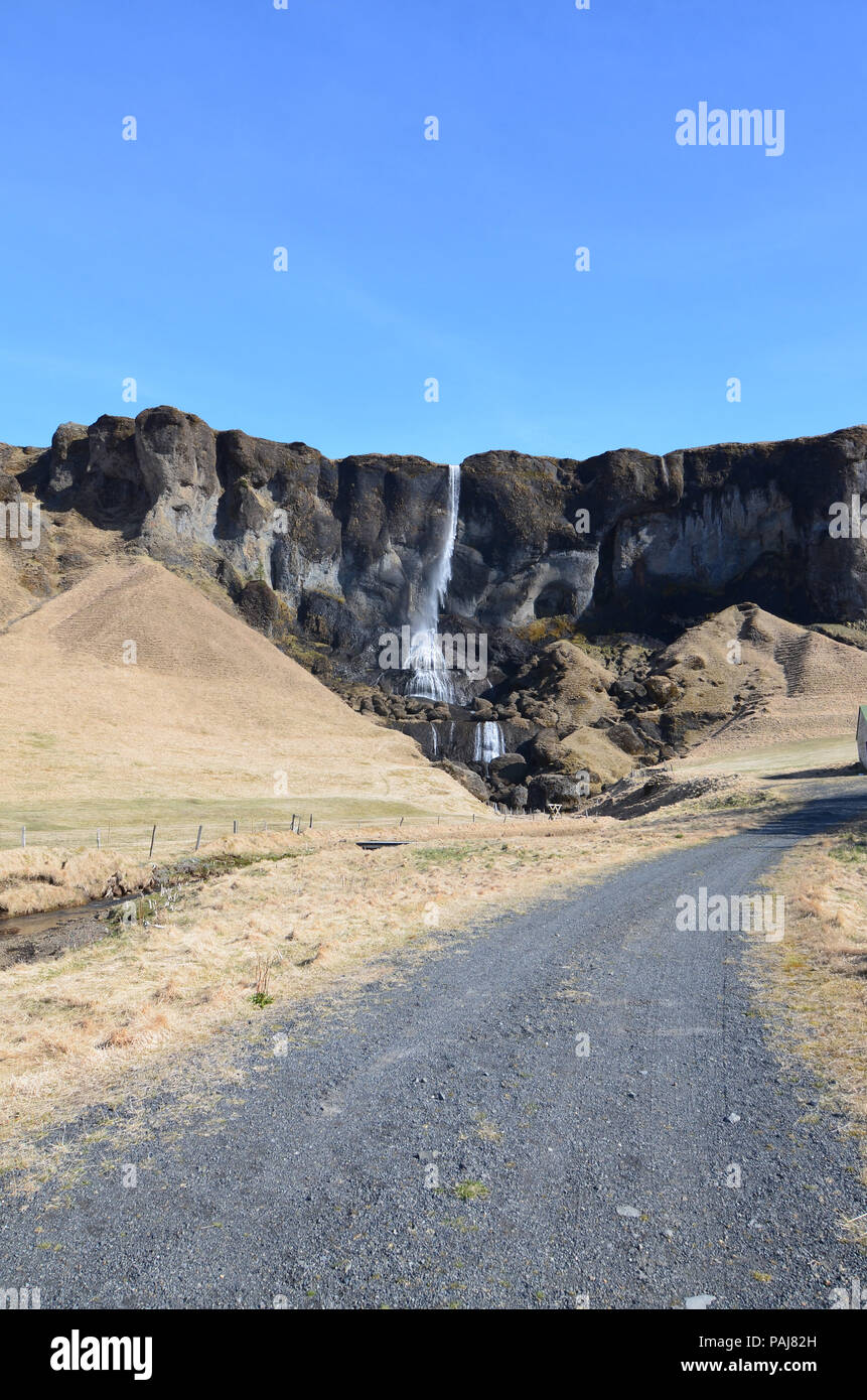 Pretty landscape in Vik Iceland with a waterfall Stock Photo - Alamy