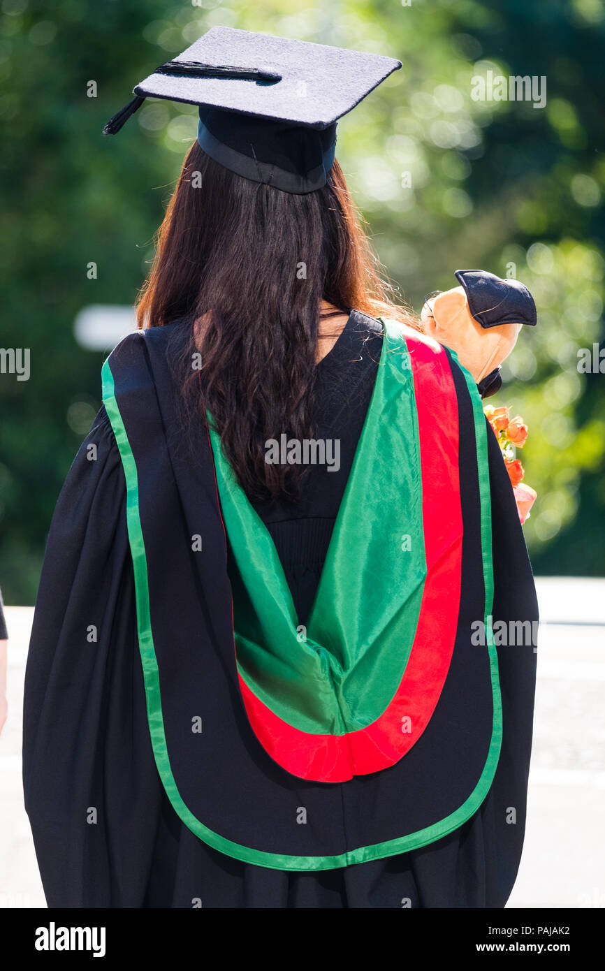 Higher Education in the UK: Rear vew of a female student graduating ...