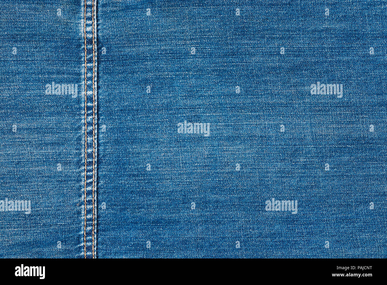 Double yellow seam on denim, background, texture. View from above Stock ...