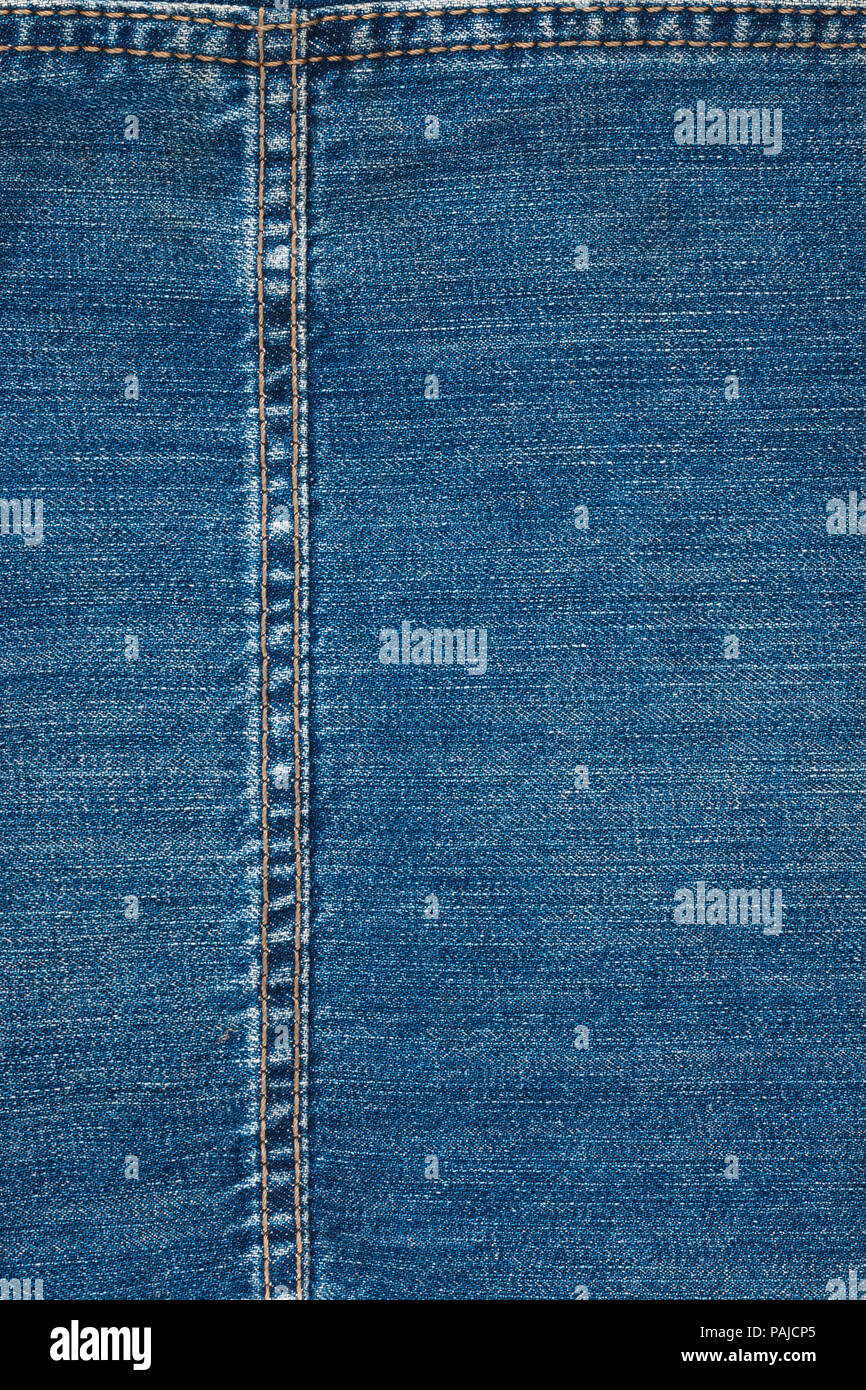 Double yellow seam on denim, background, texture. View from above Stock ...