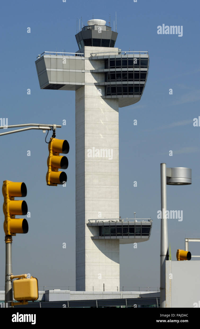 traffic signals with air-traffic control-tower behind Stock Photo - Alamy