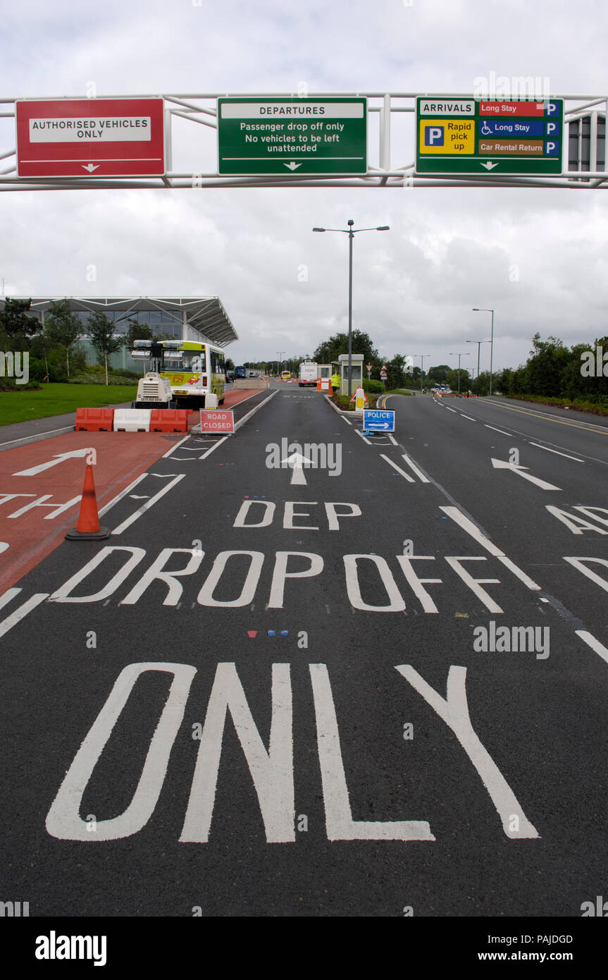road-block and blockaded approach road to the terminal and signs with ...