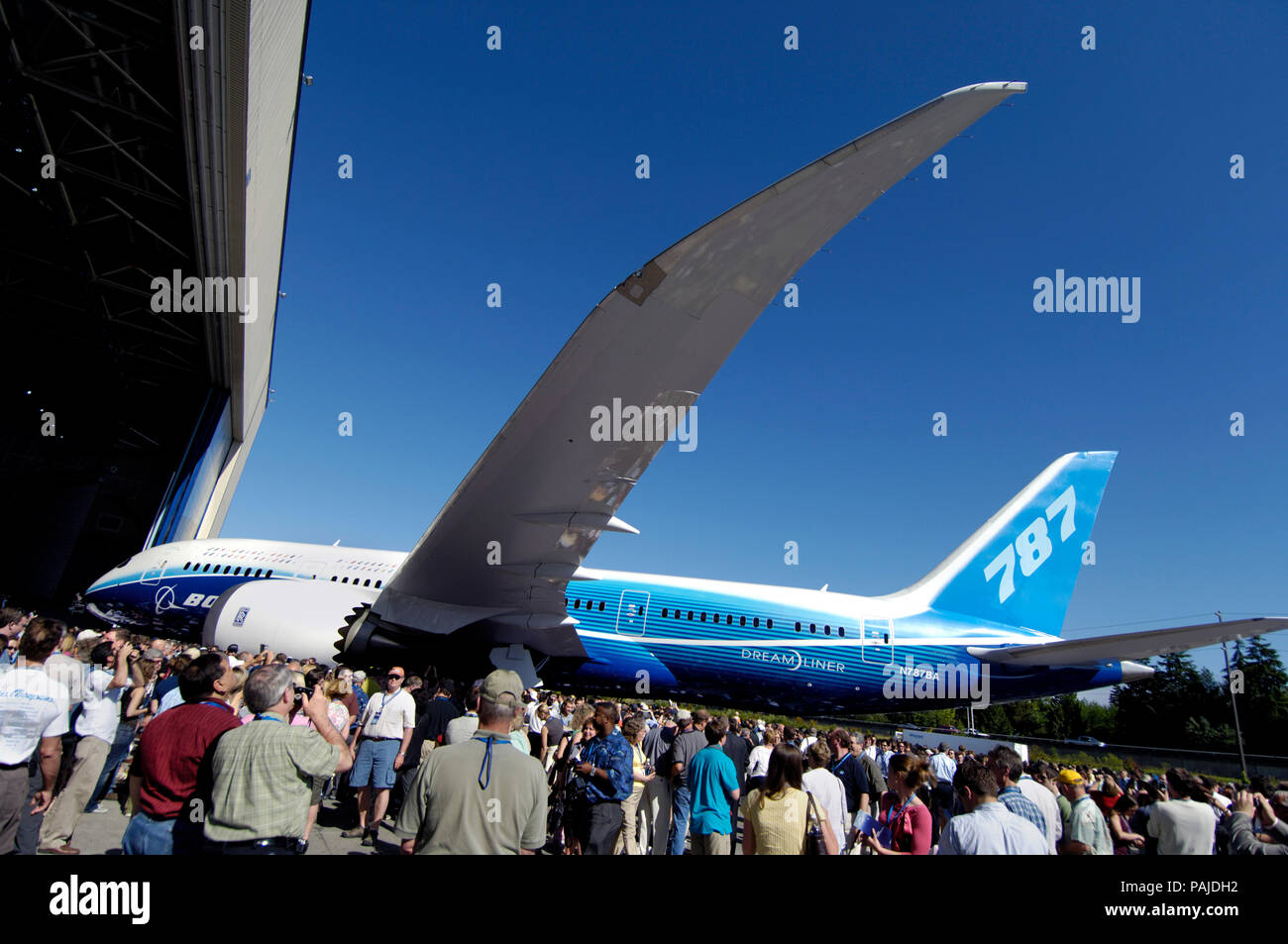 people crowding around the first Boeing 787-8 Dreamliner with Rolls ...