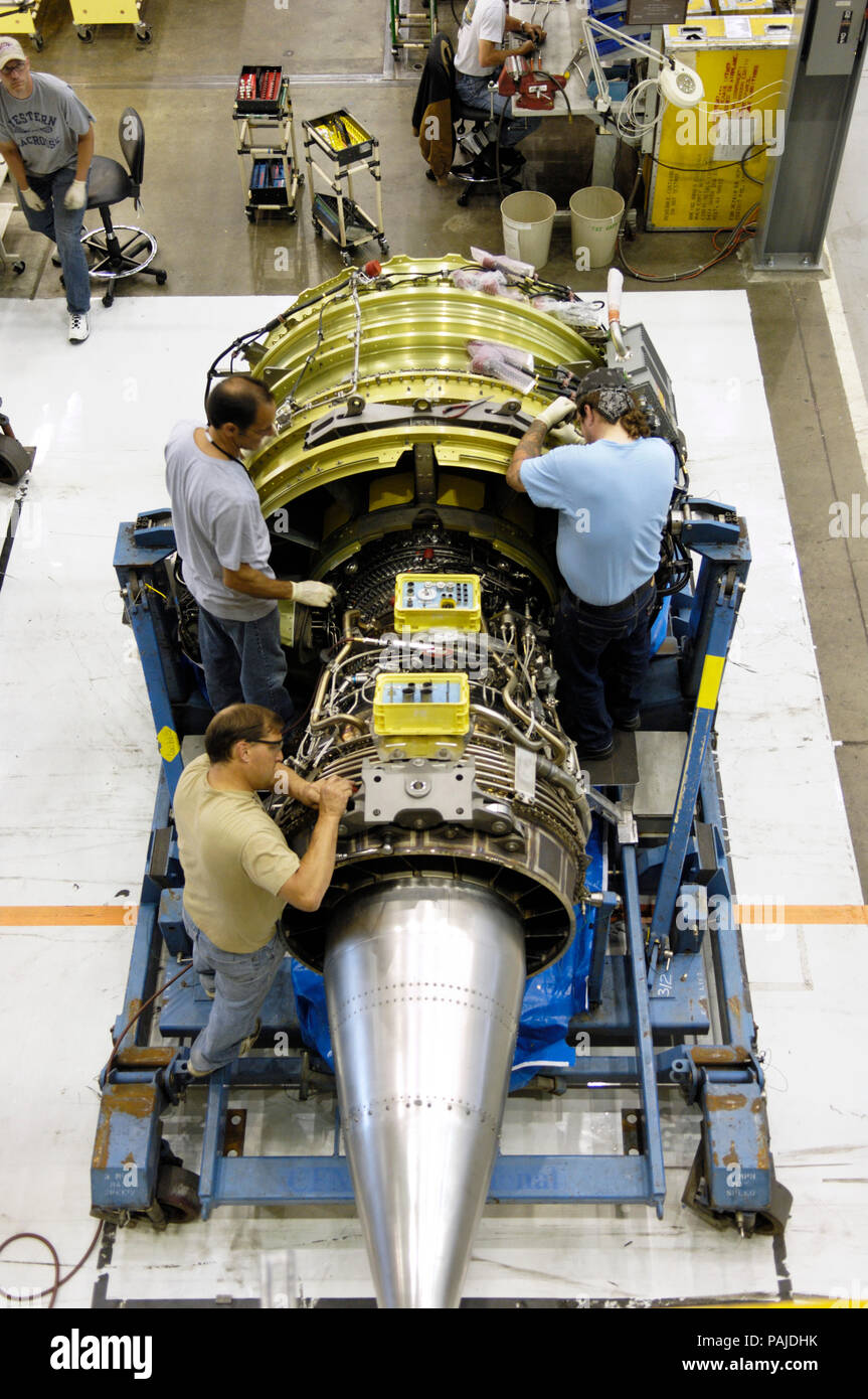 engineers working on a CFM-56-7B engine on the production-line Stock ...