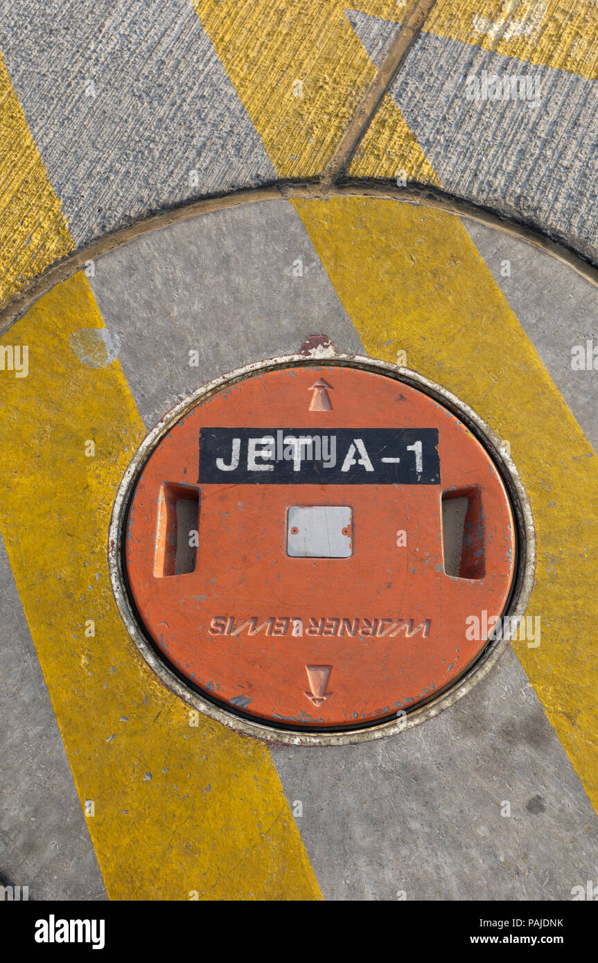 Jet A-1 Avtur refuelling point on the apron with markings, man-hole ...