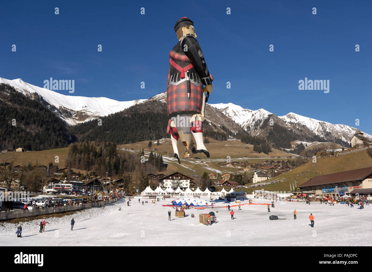 a Cameron SS Piper special shape hot-air balloon flying Stock Photo - Alamy