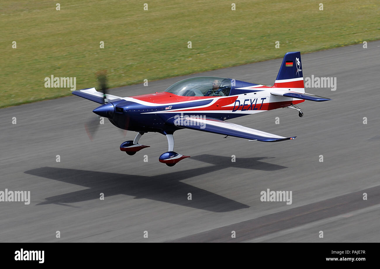 Doug Vayda landing the prototype Extra EA-330LT on runway 27 at ...
