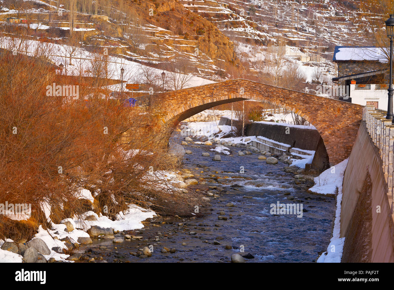 Benasque medieval bridge over Esera River in Huesca Spain Stock Photo ...