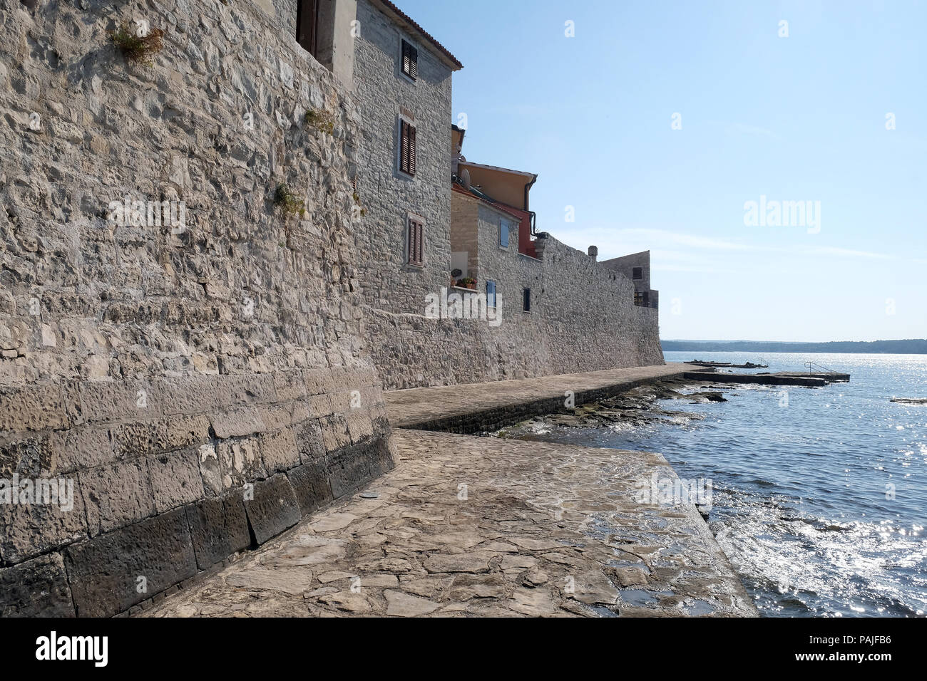 Beach in the small idyllic city Novigrad located on the west coast of ...