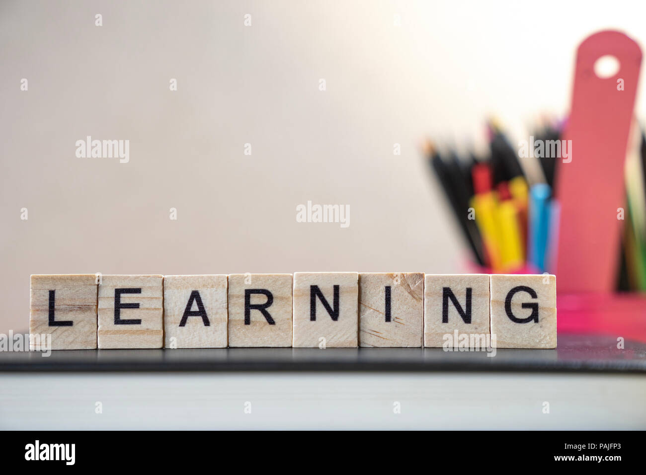 Learning word collected from wooden elements with the letters ...