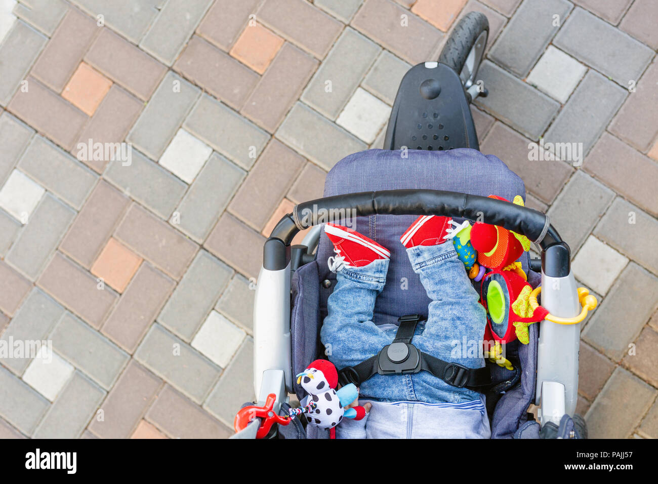 Kid sleeping stroller hi-res stock photography and images - Alamy