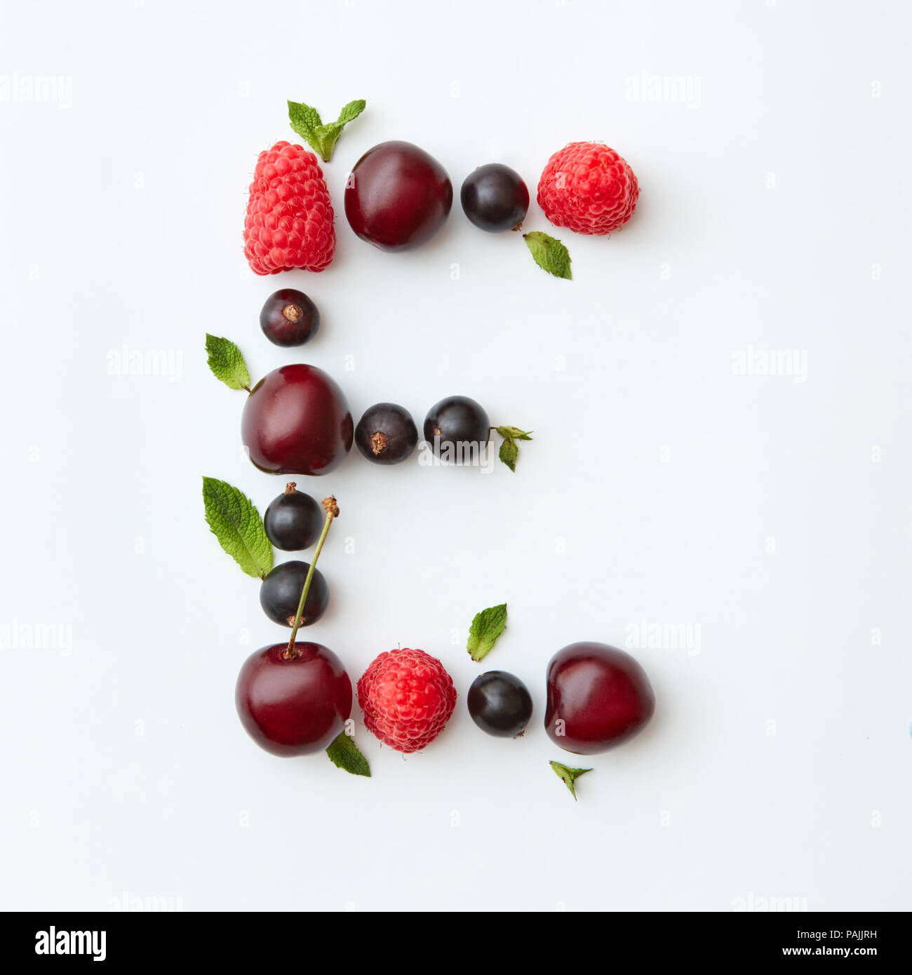 Fresh fruits pattern of letter E english alphabet from natural ripe ...