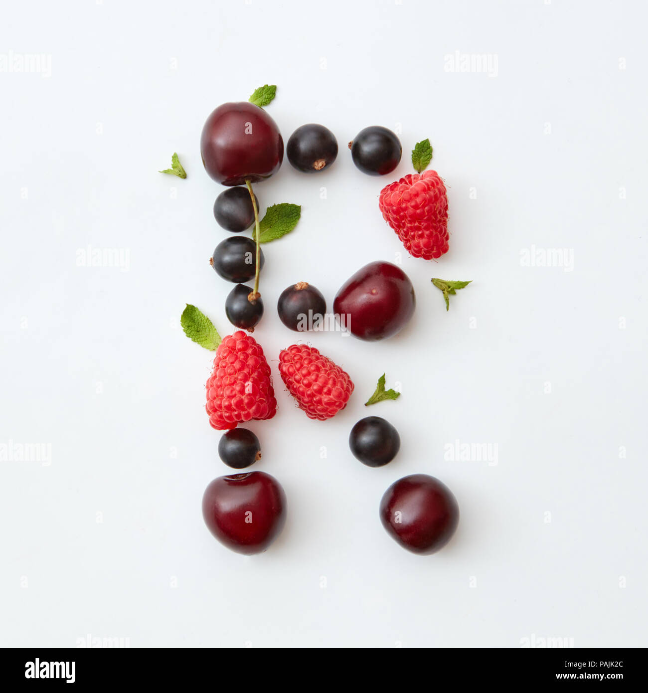 Summer pattern of letter R english alphabet from natural ripe berries ...