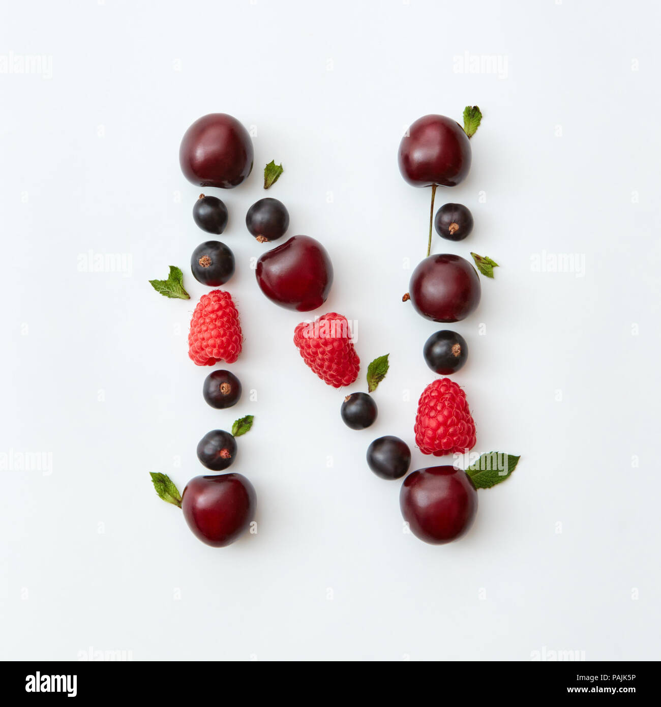 Fruits pattern of letter N english alphabet from natural ripe berries ...