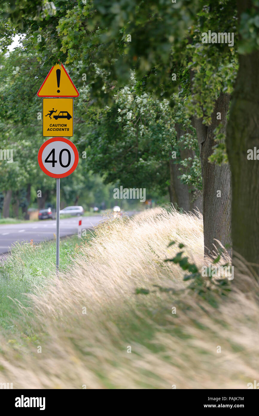 Dangerous road and warning sign with caution accidents description ...