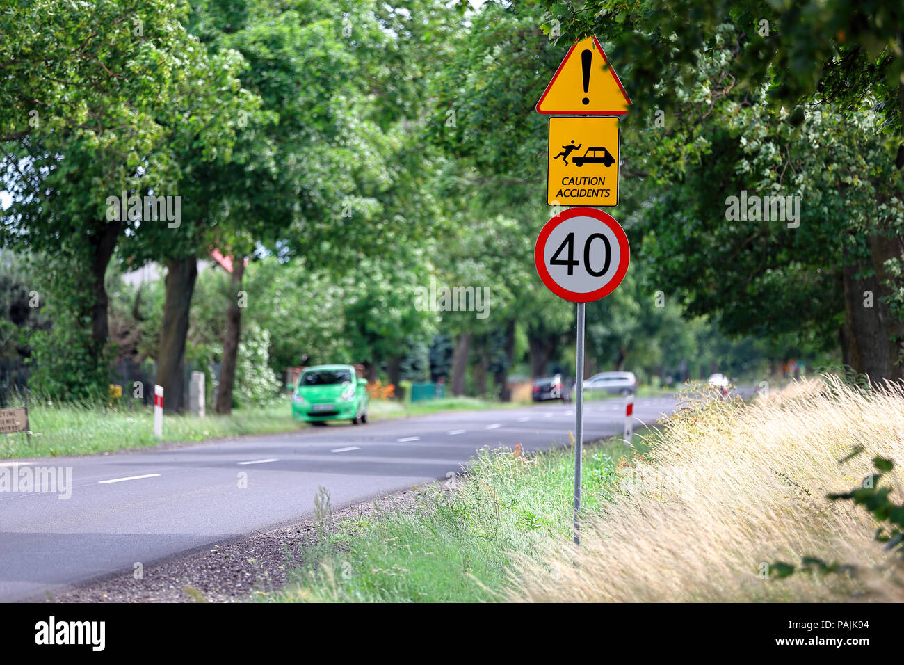 Dangerous road and warning sign with caution accidents description ...