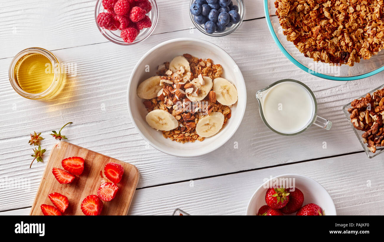 Healthy natural breakfast with organic ingredients corn flakes, banana ...