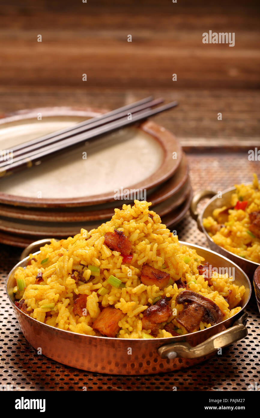 Chicken with basmati rice fried in stainless pan Stock Photo - Alamy