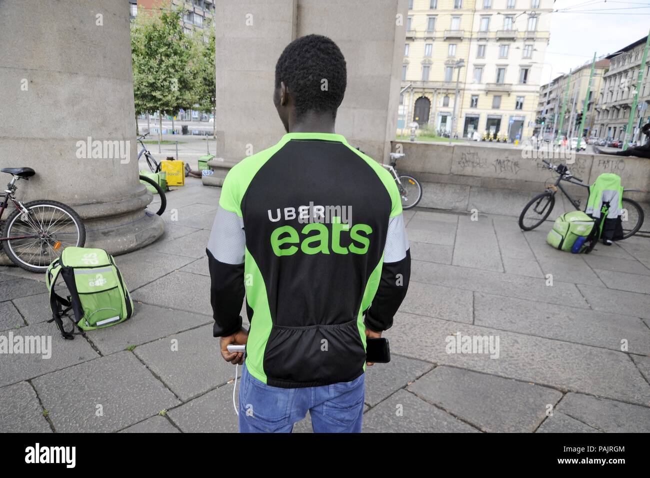delivery men in Milan (Italy Stock Photo - Alamy