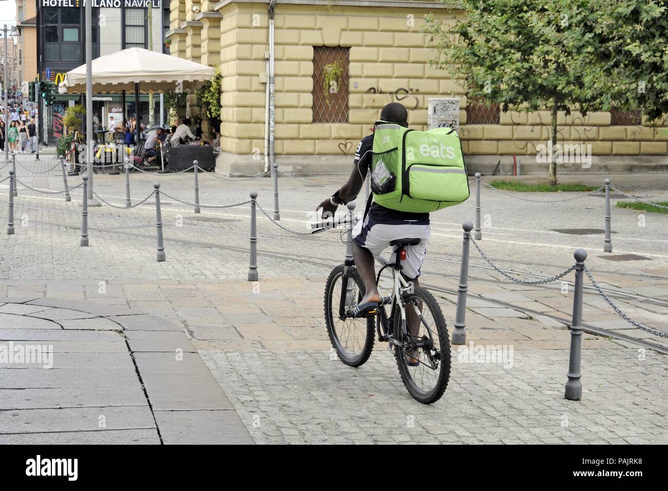 delivery men in Milan (Italy Stock Photo - Alamy