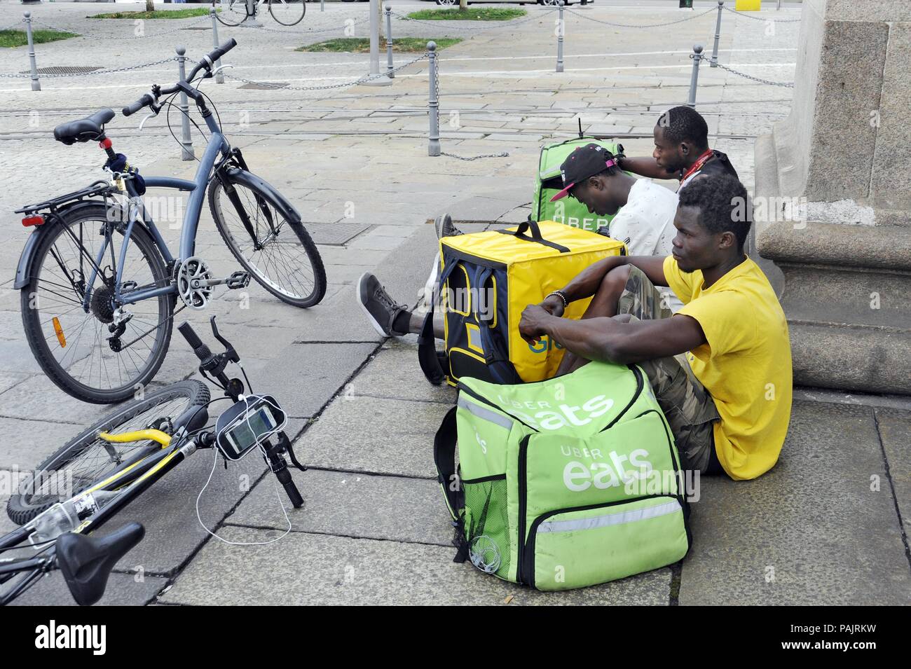 delivery men in Milan (Italy Stock Photo - Alamy