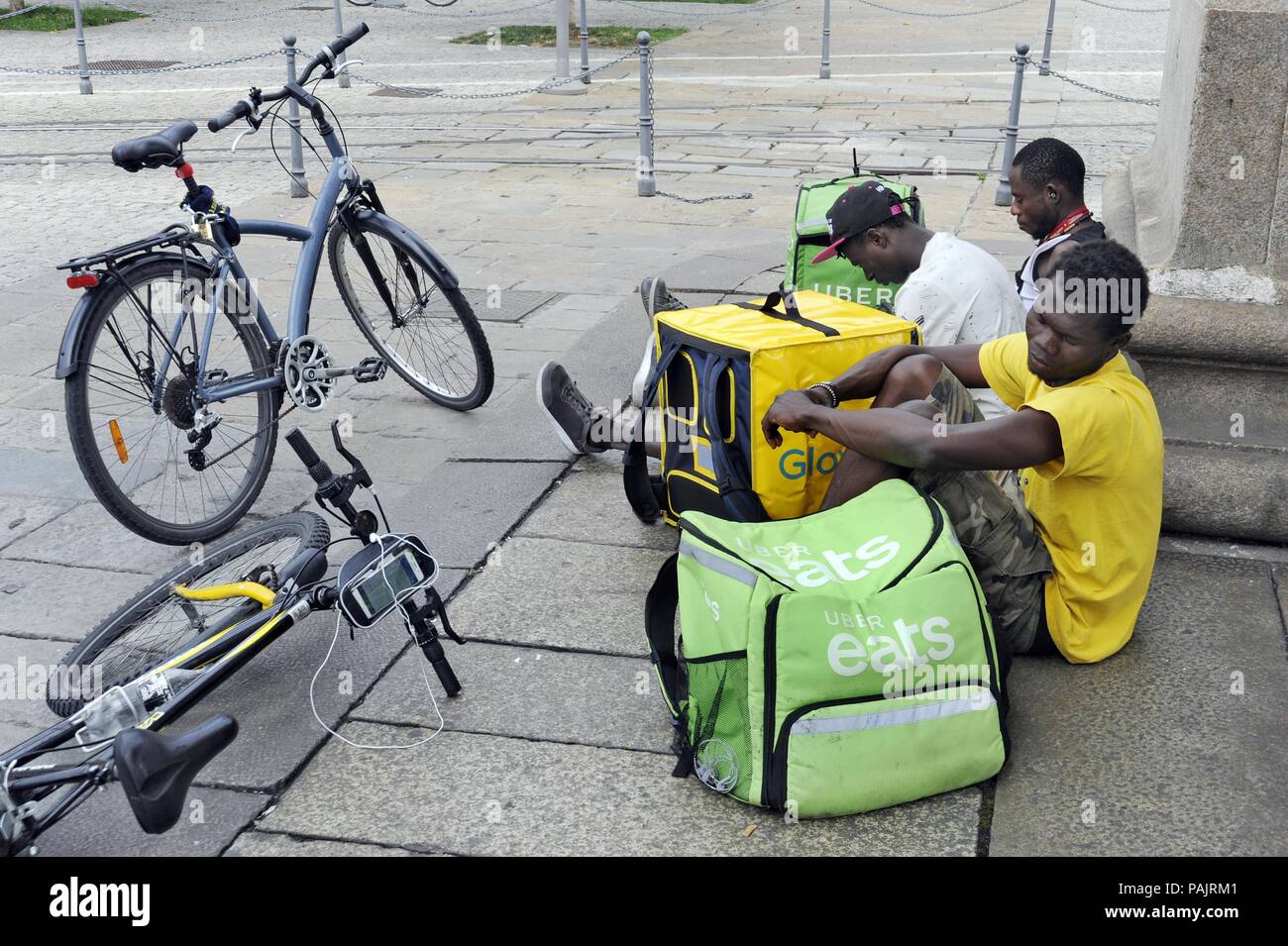 delivery men in Milan (Italy Stock Photo - Alamy