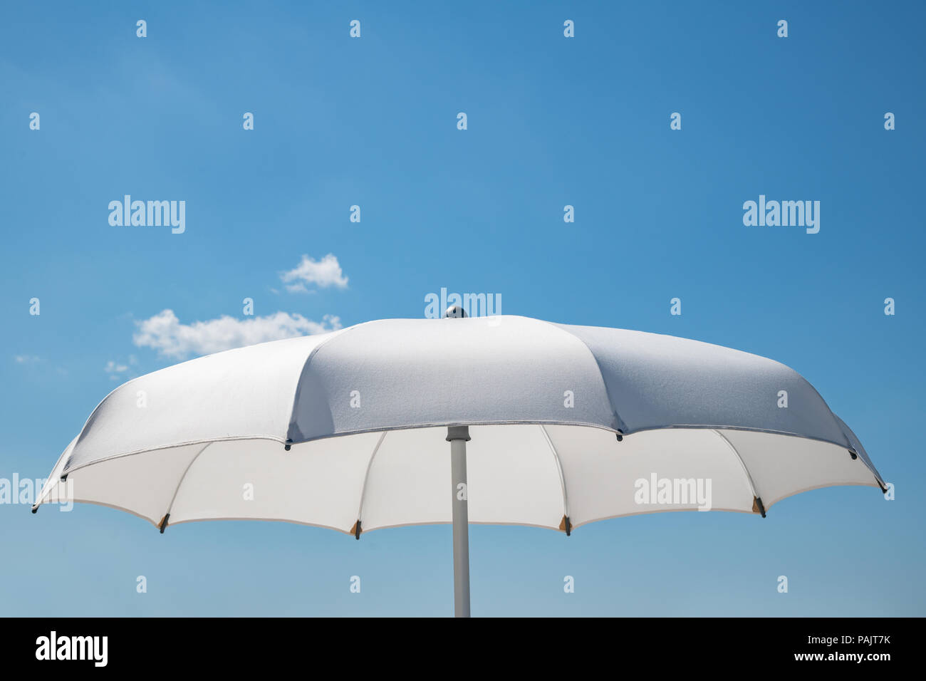 Parasol, umbrella at a beach Stock Photo - Alamy