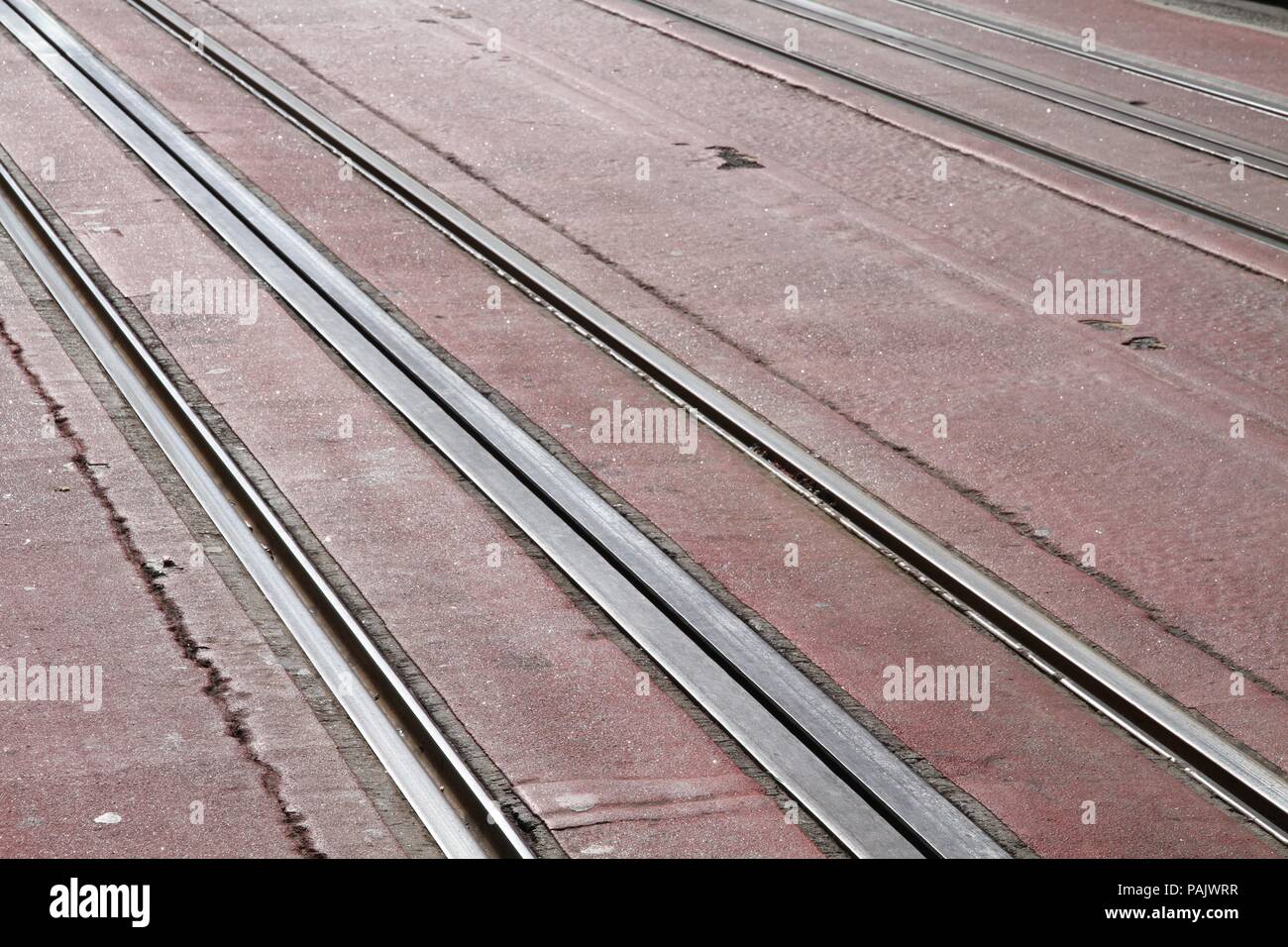 Tram track on a red road in San Francisco Stock Photo - Alamy