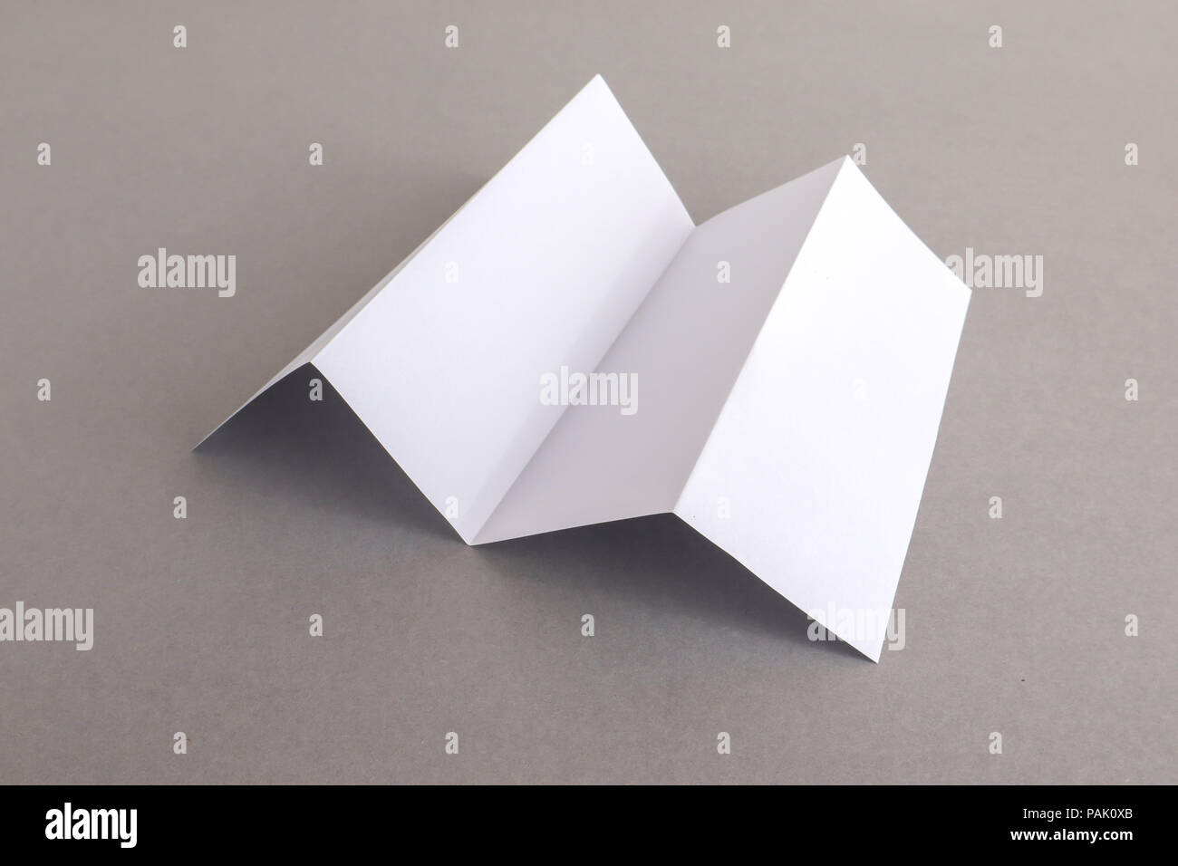 template fold white paper on gray background bussnese concept Stock ...
