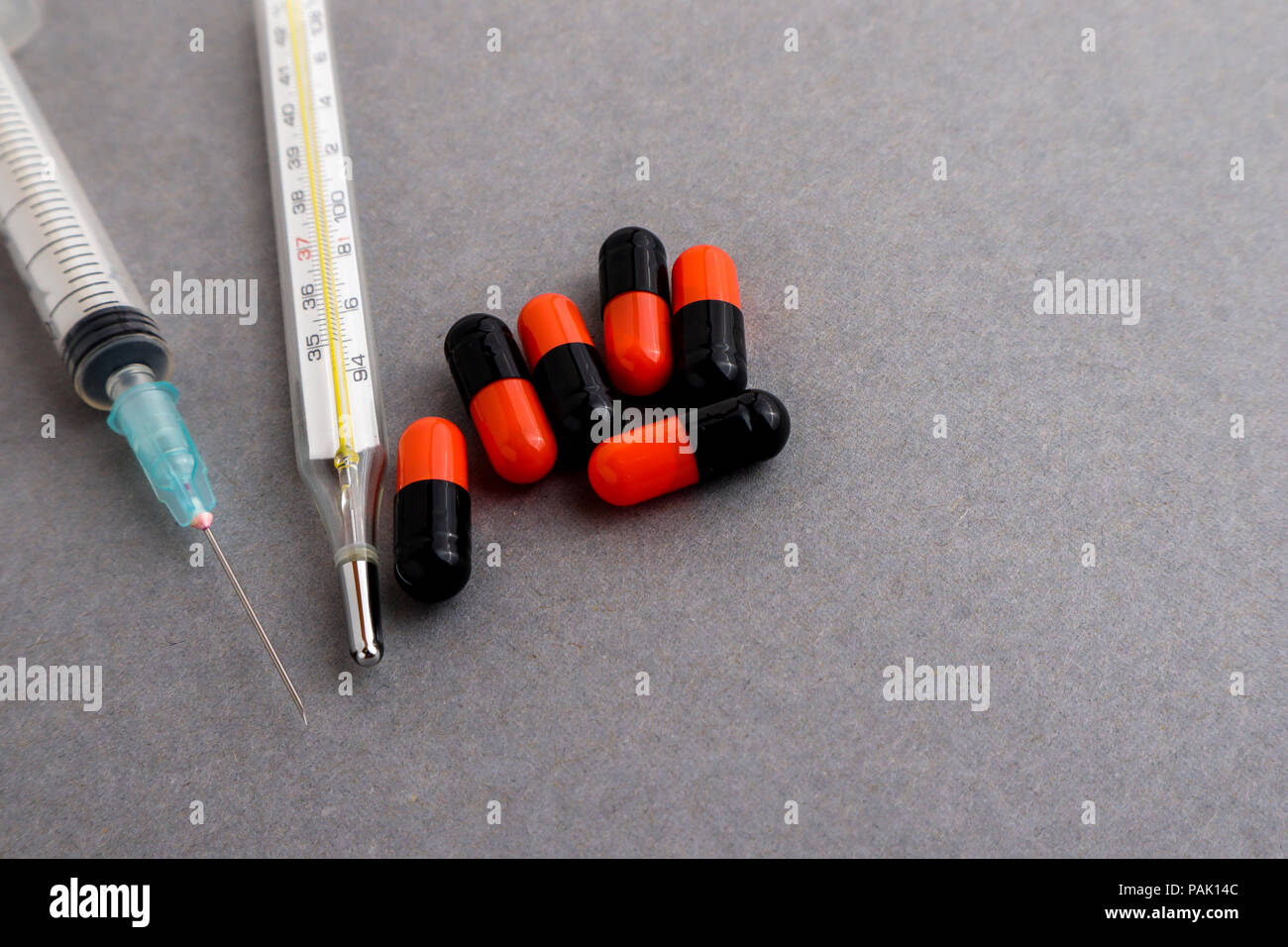 Medical equipments including syringe, drug medicines background, top ...