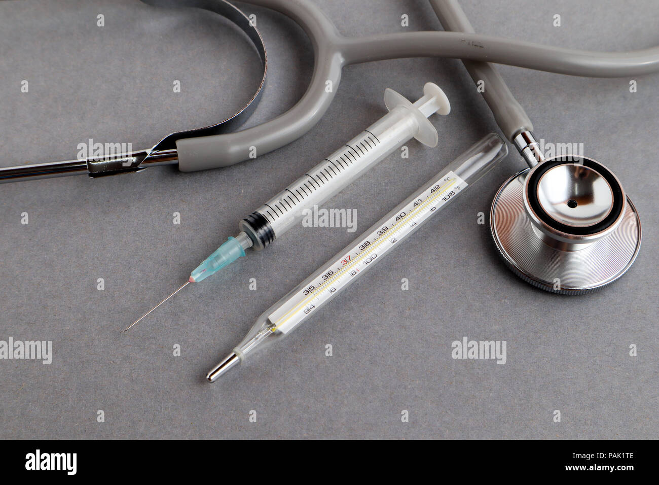 Medical equipments including stethoscope, syringe, medicines background ...