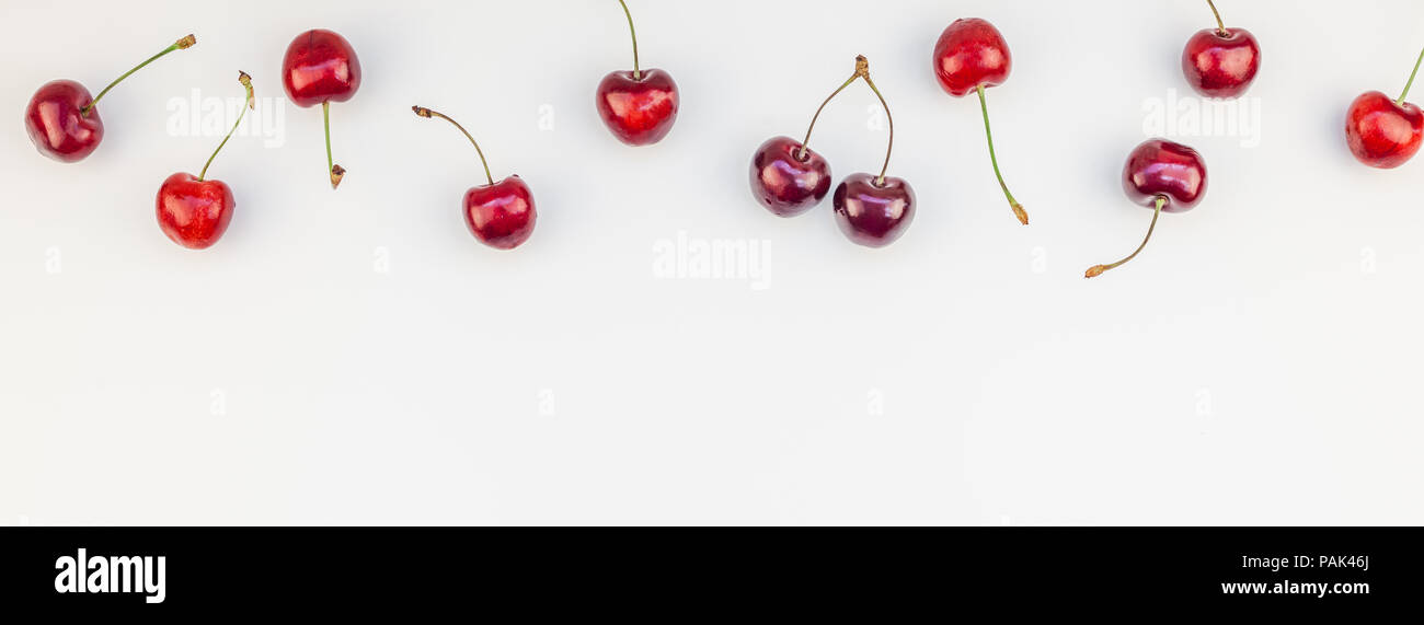 Long wide banner of fresh ripe cherry pattern layout with copy space ...