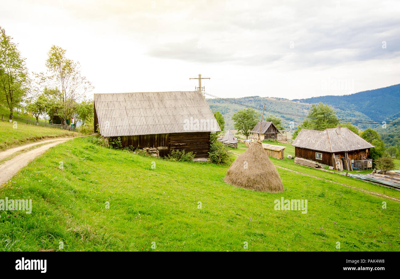 Small old village on the mountain in a Transylvanian rural area with ...