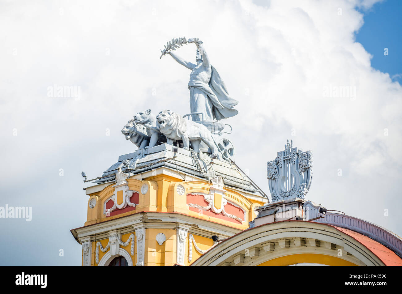Statue on allegorical car pulled by lions on a tower at the Cuj-Napoca ...