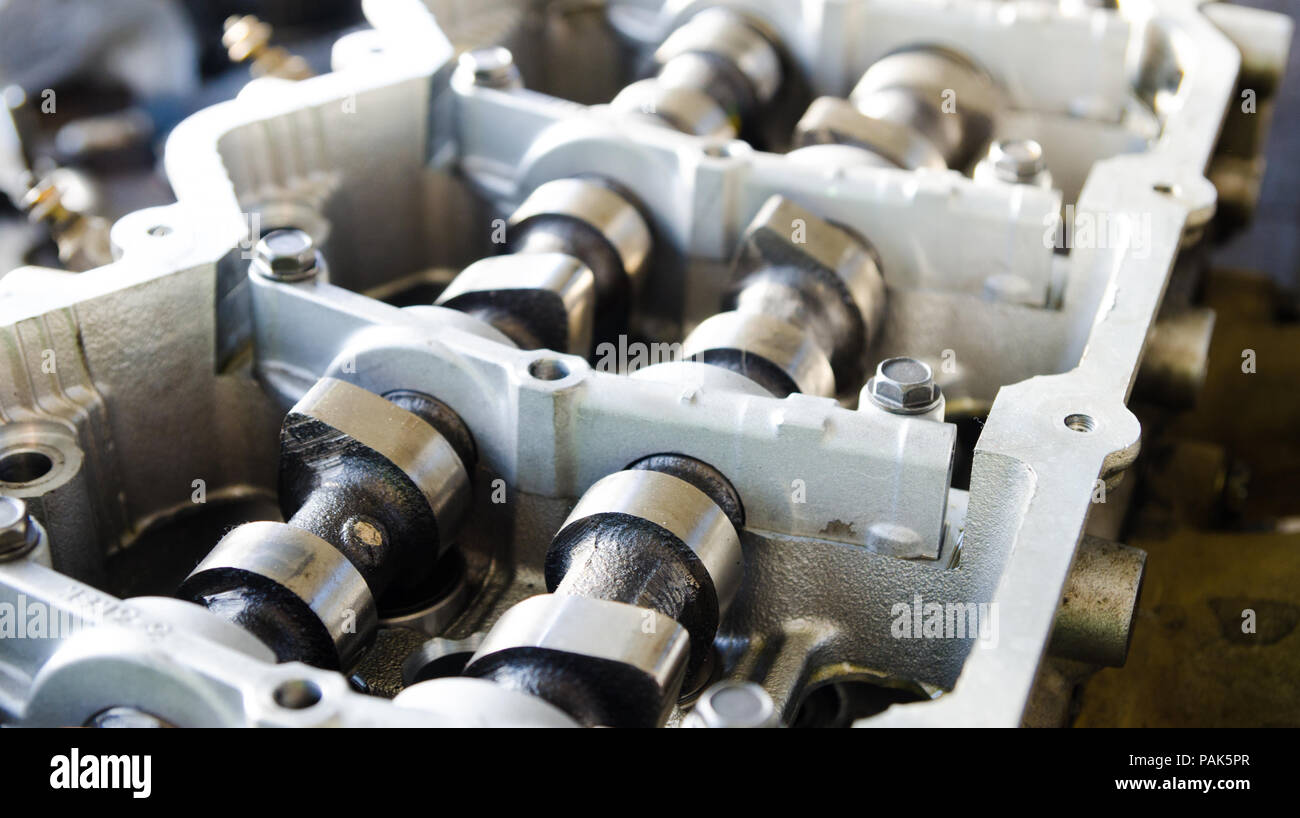 Open engine block exposing the pistons and crankshaft in a service ...
