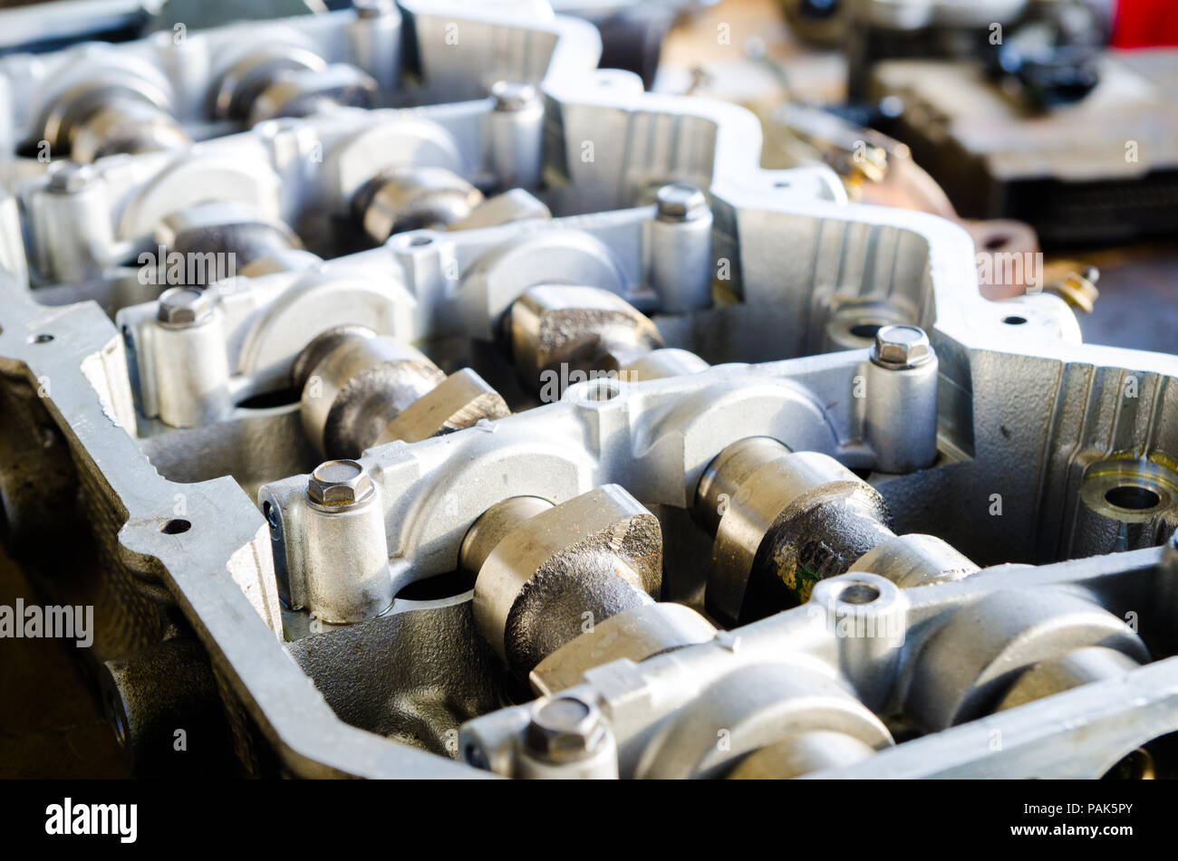 Open engine block exposing the pistons and interior parts with bright ...