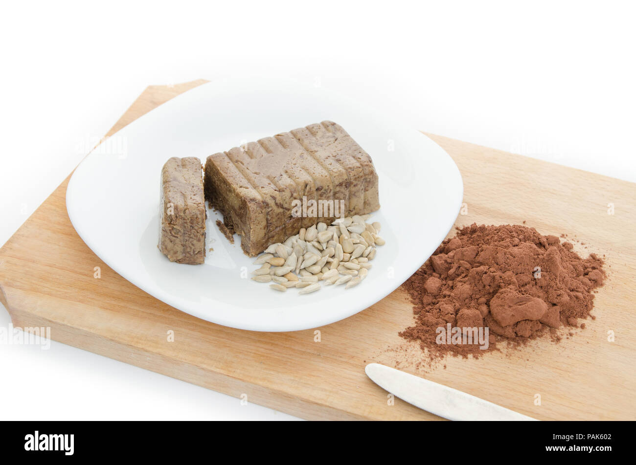 Traditional eastern europe greek romanian and turkish halva or halvah dessert with sunflower ...
