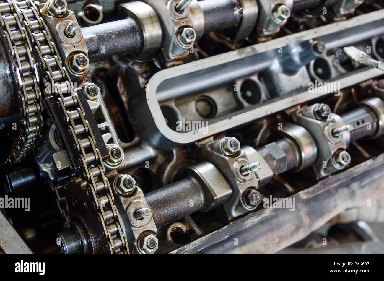Engine block open exposing the interior distribution chain and pistons ...