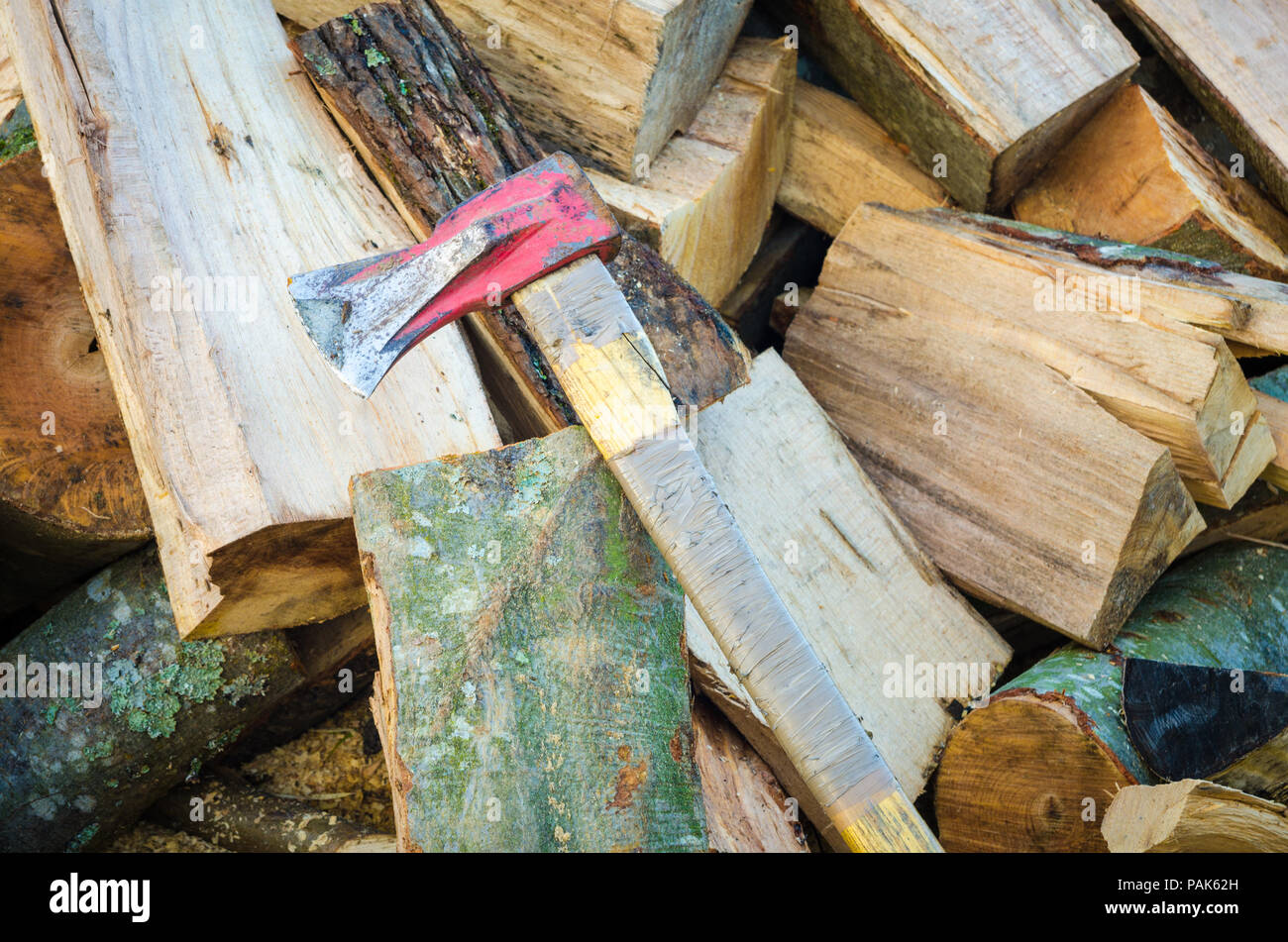 Chopped wood in a stack Stock Photo - Alamy