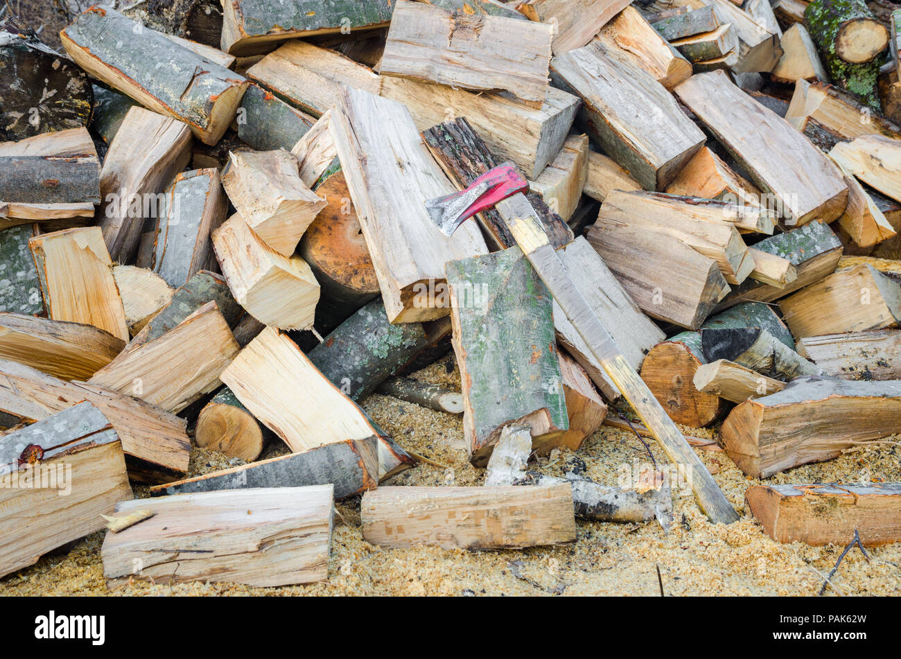 Chopped wood in a stack Stock Photo - Alamy