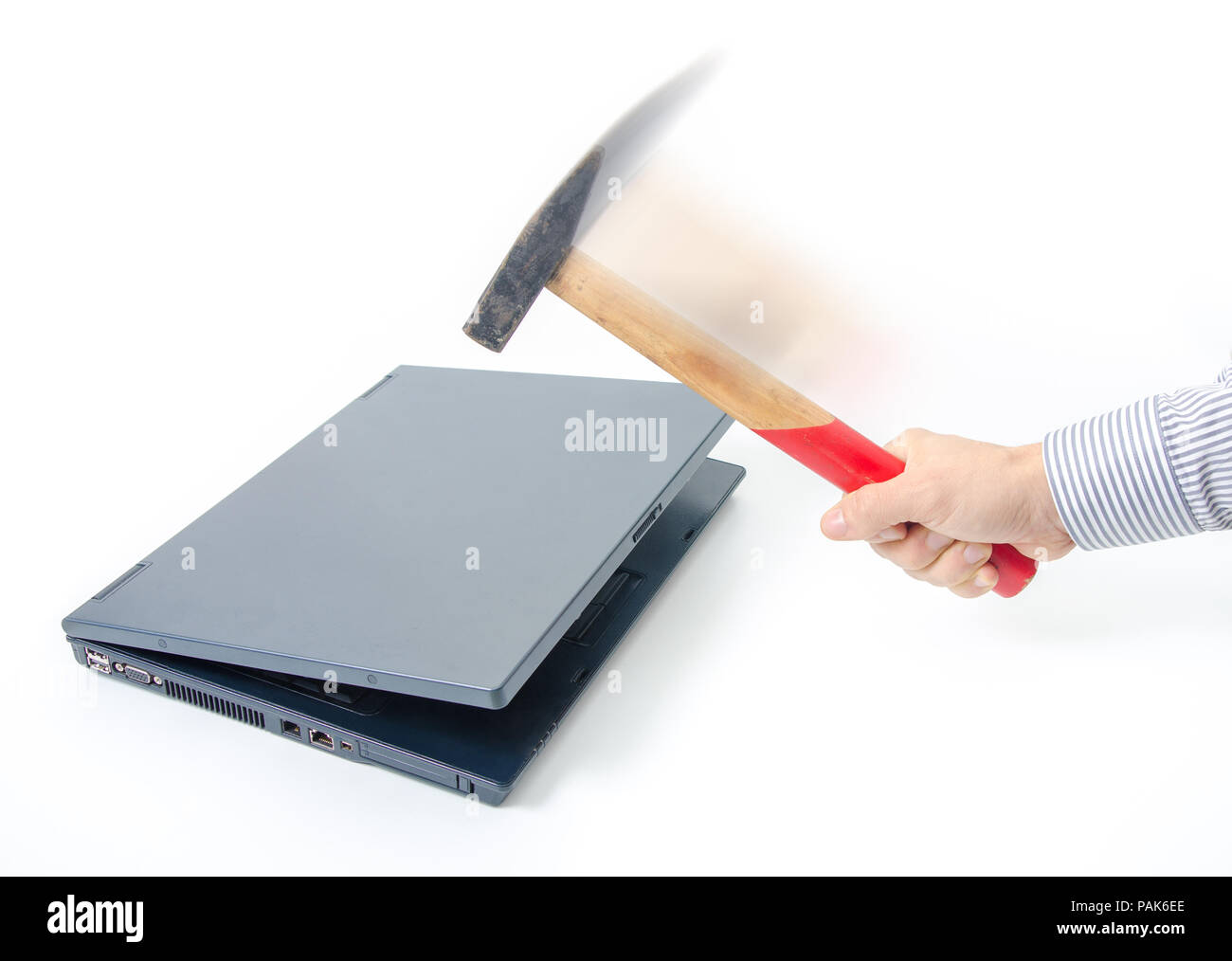 Destroying an old laptop suggesting data hack, old technology, slow ...