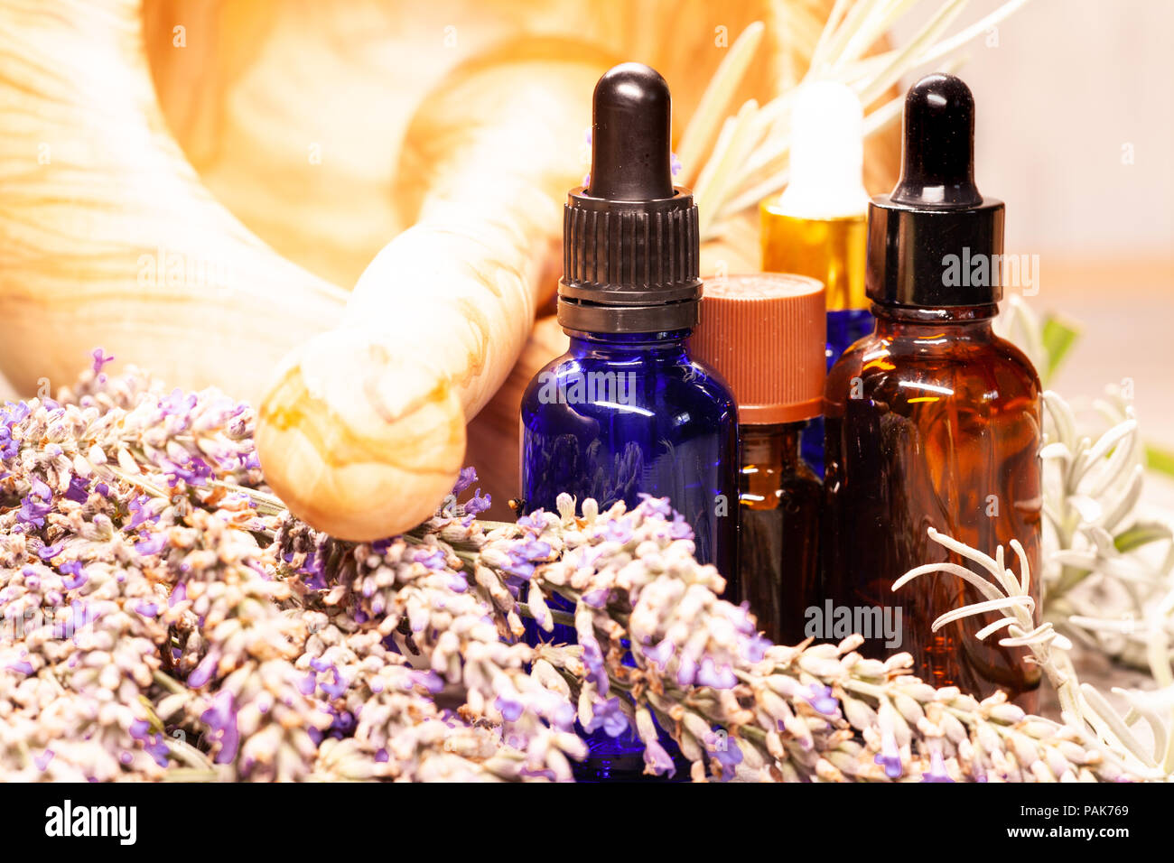 lavender mortar and pestle and bottles of essential oils for aromatherapy Stock Photo - Alamy