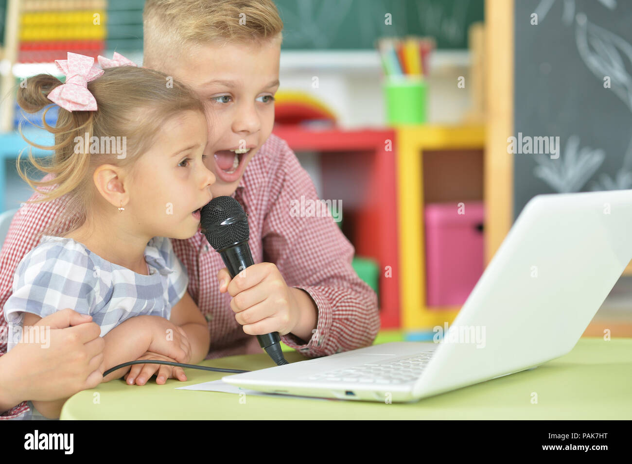 Brother And Sister Singing High Resolution Stock Photography and Images ...