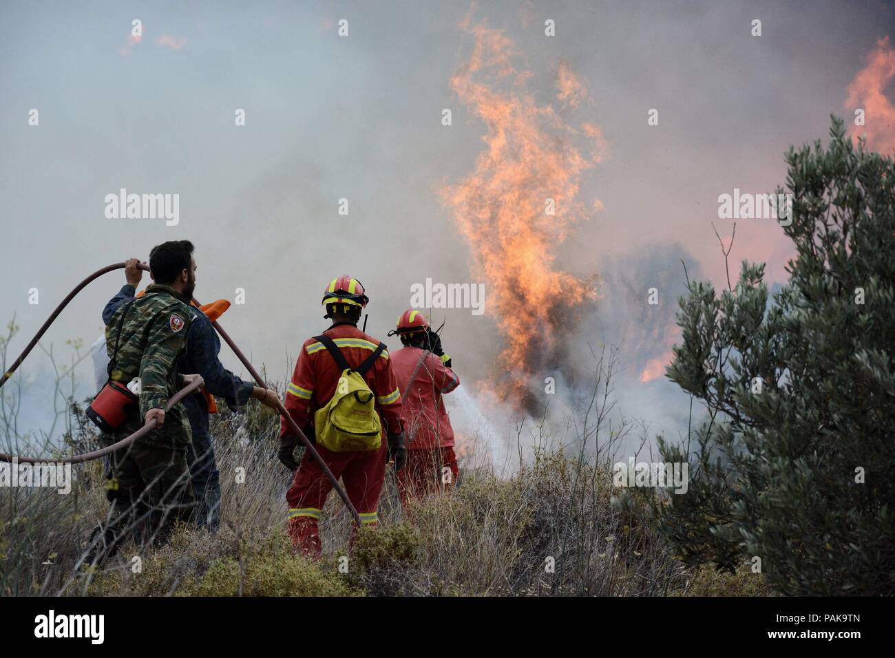 Athens, Greece. 23rd July 2018. Firefighters and volunteer firefighters ...