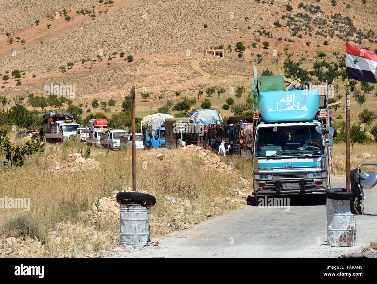 (180723) -- DAMASCUS, July 23, 2018 (Xinhua) -- Vehicles transporting ...