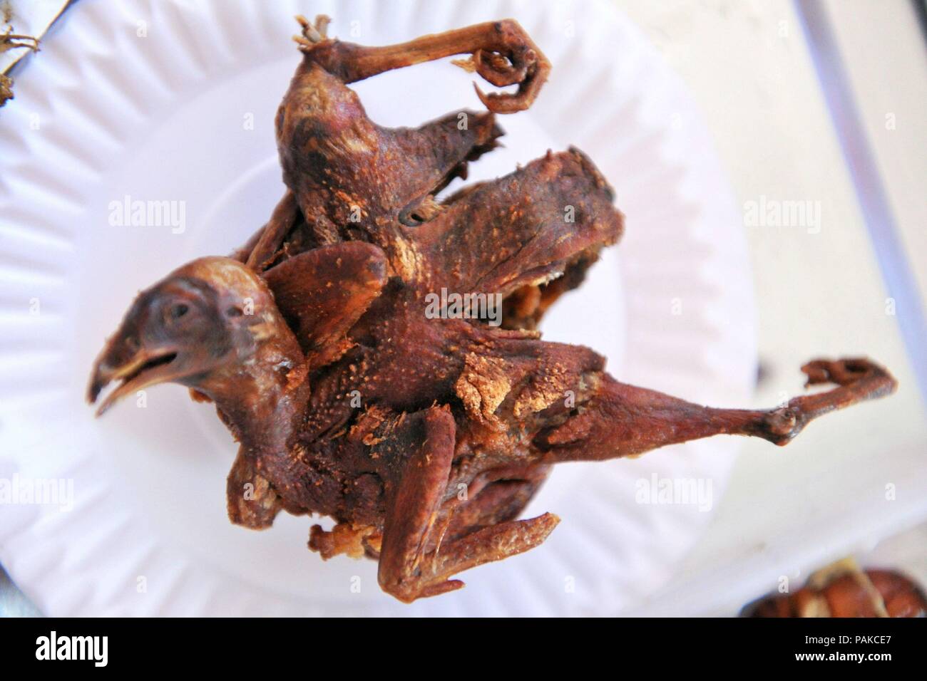 China. 24th July, 2018. Qingdao, CHINA-Fried insects including ...