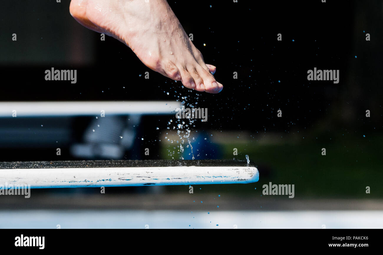 Hanover, Germany. 18th July, 2018. A visitor jumps into the water at ...