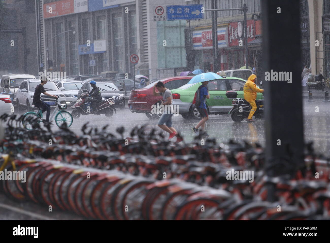Chengdu,Sichuan,China,24th July,2018.Heavy rain has suddenly disrupted ...